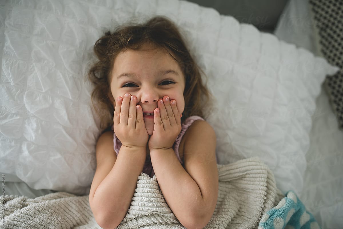 "Funny Faces In Bed" by Stocksy Contributor "Courtney Rust" - Stocksy