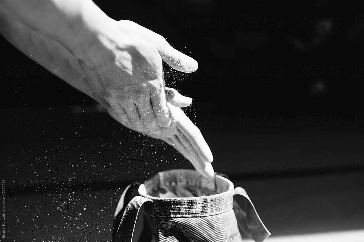 "Indoor Climber Chalking Up" by Stocksy Contributor "Brianna Lee" - Stocksy