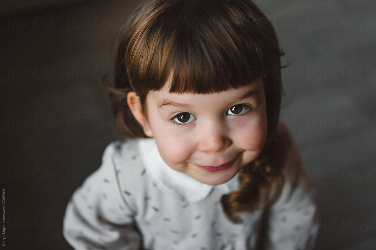 "Cute Toddler Girl Looking At Camera" by Stocksy Contributor "Giorgio ...