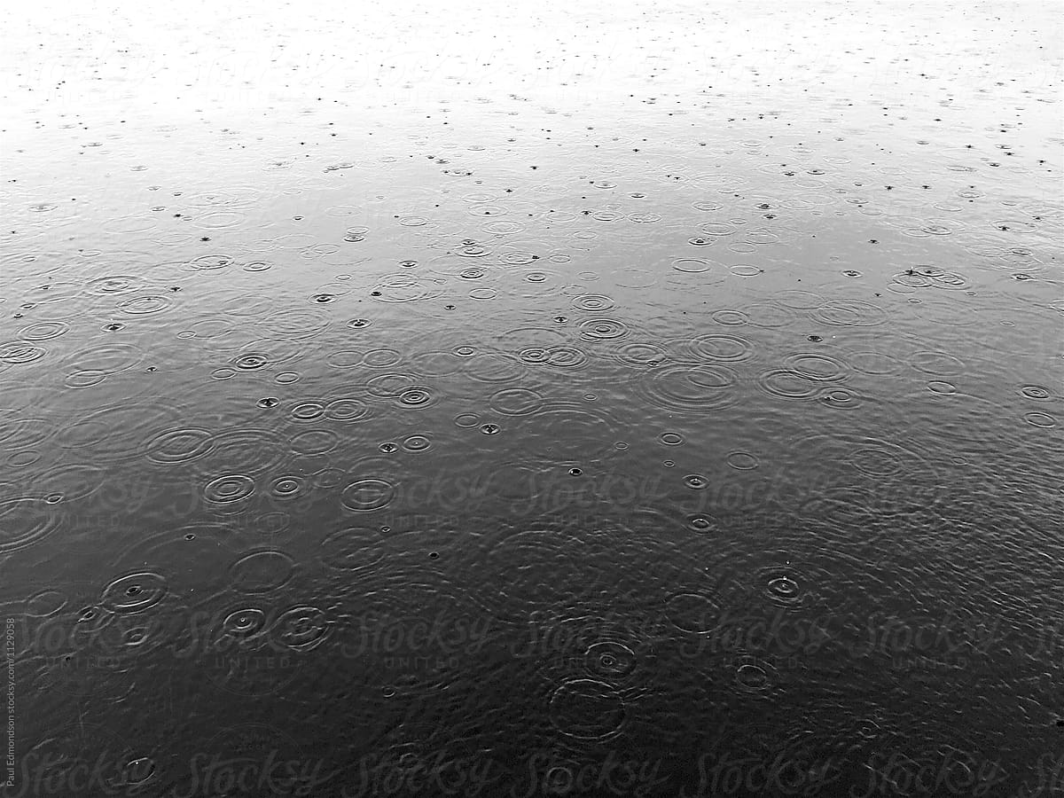 "Heavy Rain Falling On Lake Water" by Stocksy Contributor "Rialto ...