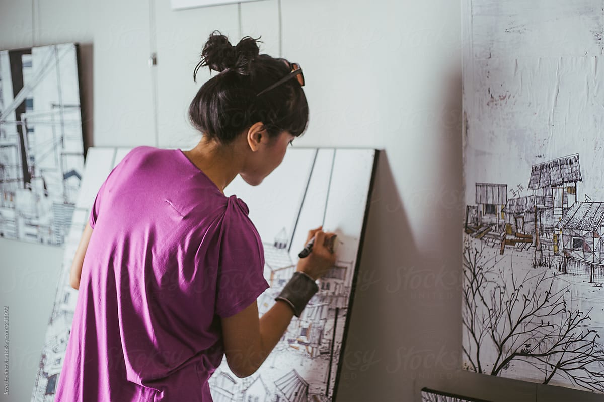 "Woman Artist Drawing On Canvas For Her New Project" by Stocksy ...