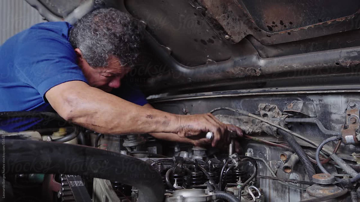 "Mechanic Tightening Nuts On An Engine" by Stocksy Contributor ...