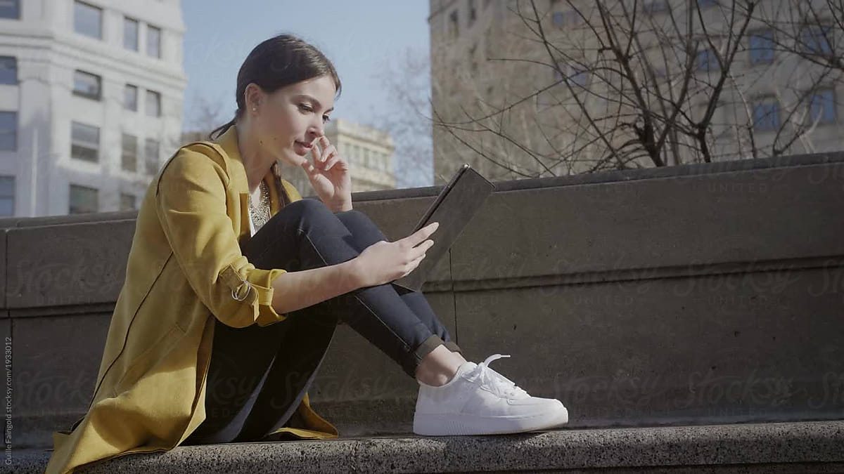 "Urban Woman Sitting On Bench." by Stocksy Contributor "Guille Faingold ...