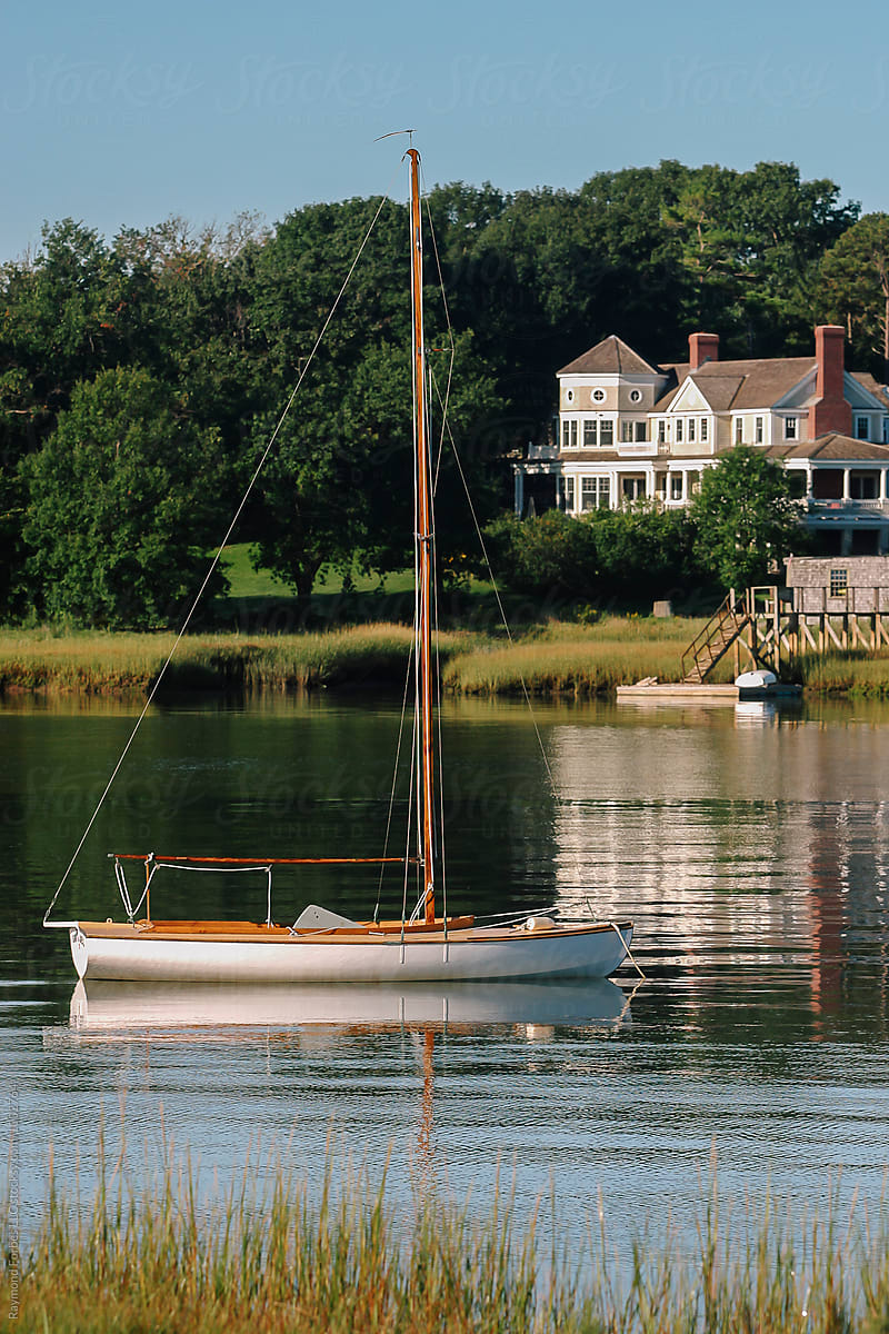"Wooden Boat In Harbor" by Stocksy Contributor "Raymond Forbes LLC ...