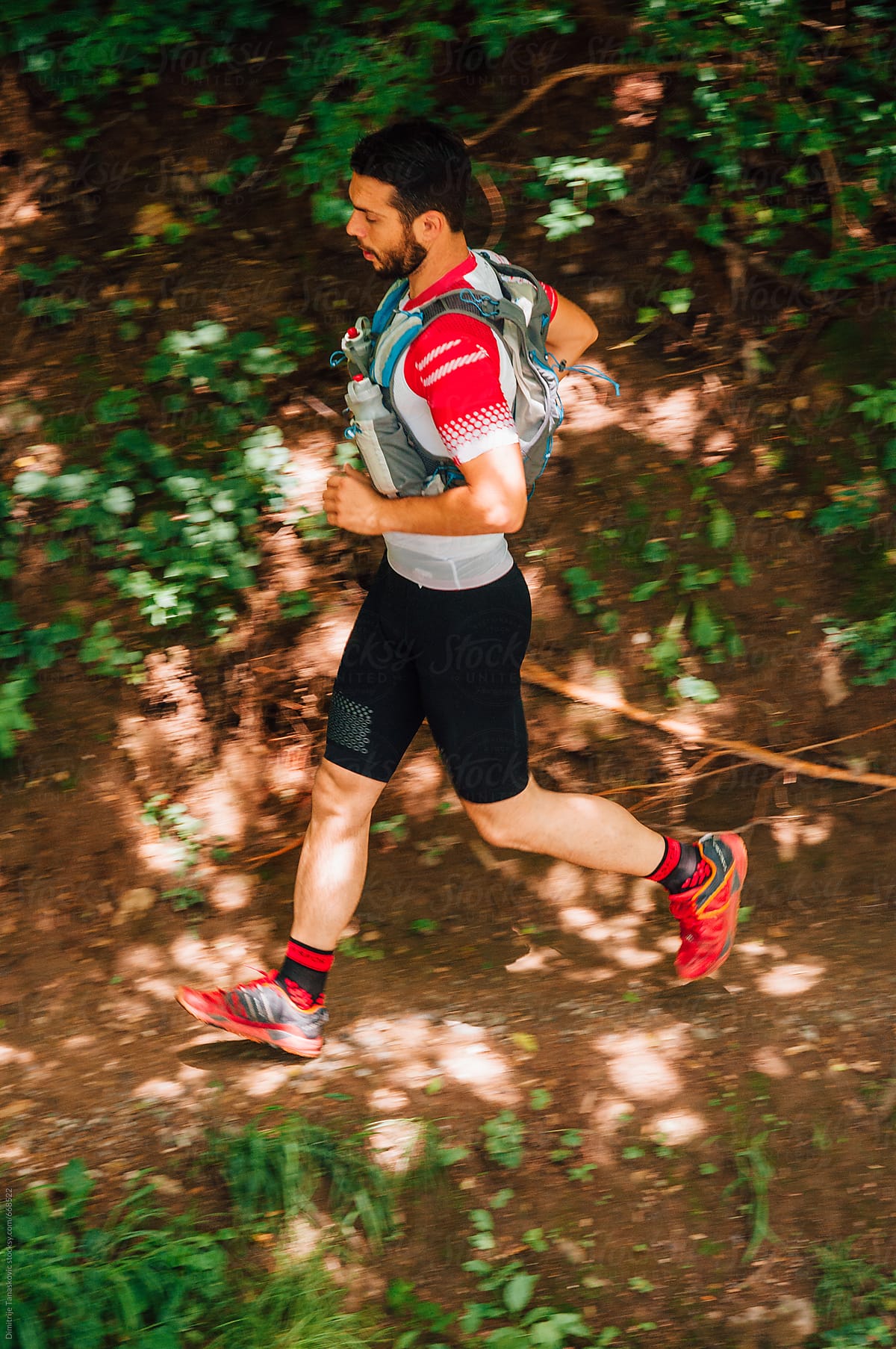 "Man Running In Nature" by Stocksy Contributor "Dimitrije Tanaskovic ...