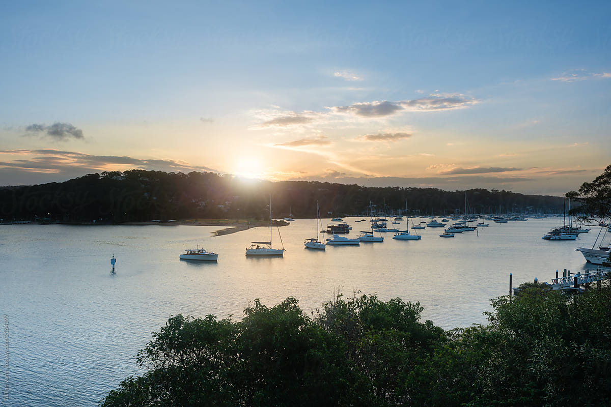 "Sun Setting On Harbour In Sydney" by Stocksy Contributor "Gillian Vann ...