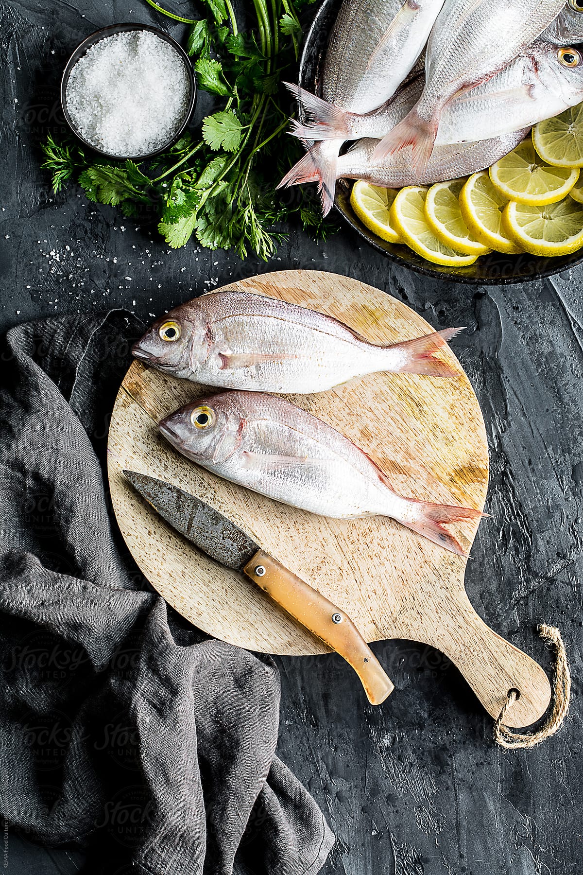 "Sea Bream On A Cutboard With Some Ingredients" by Stocksy Contributor ...