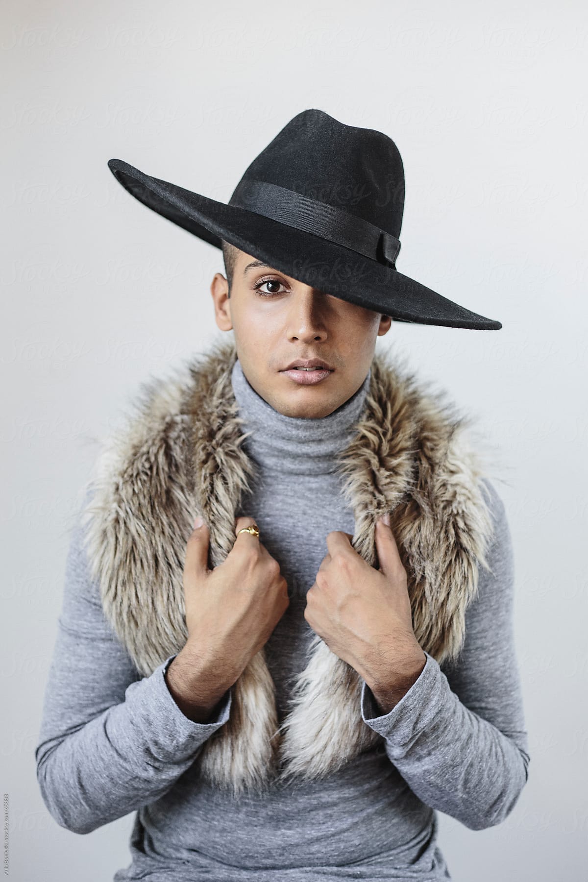 "Stylish Young Indian Man With A Hat" by Stocksy Contributor "A Model ...