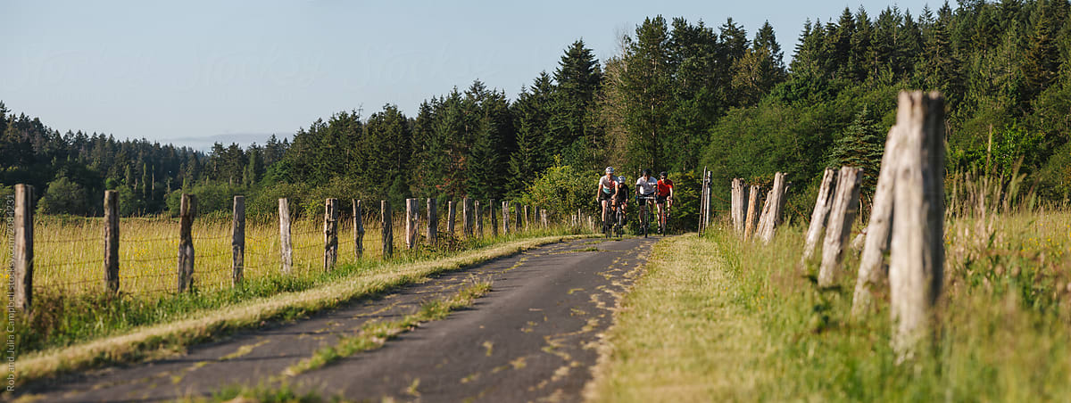 "Group Road Bike Ride In Nature" by Stocksy Contributor "Rob and Julia ...