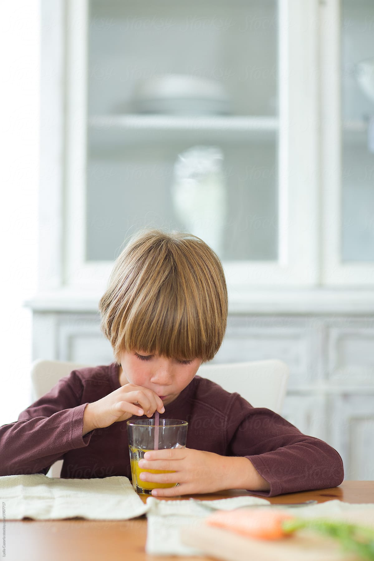 "Children Drinking A Healthy Orange Juice" by Stocksy Contributor ...