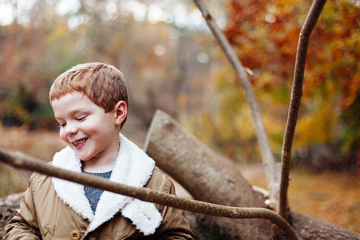 "A Bashful Little Boy" by Stocksy Contributor "Holly Clark" - Stocksy