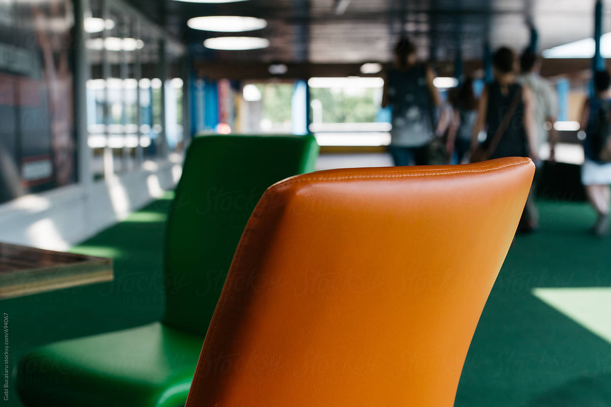 "Orange Seat By A Restaurant Table" by Stocksy Contributor "Gabi ...