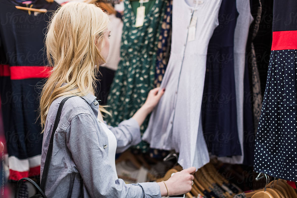 "A Woman Shopping At The Market" by Stocksy Contributor "Mauro Grigollo ...