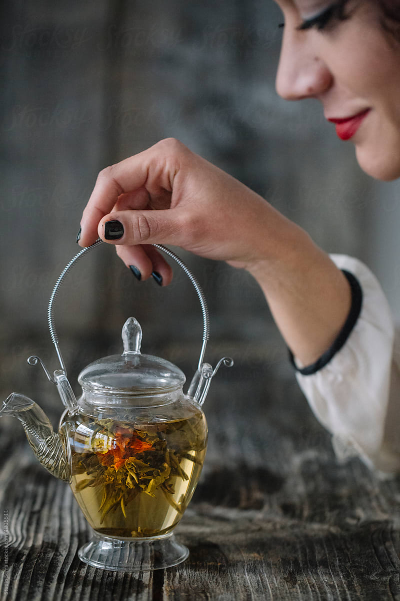 "Person With Blooming Tea Pot" by Stocksy Contributor "Studio Serra ...