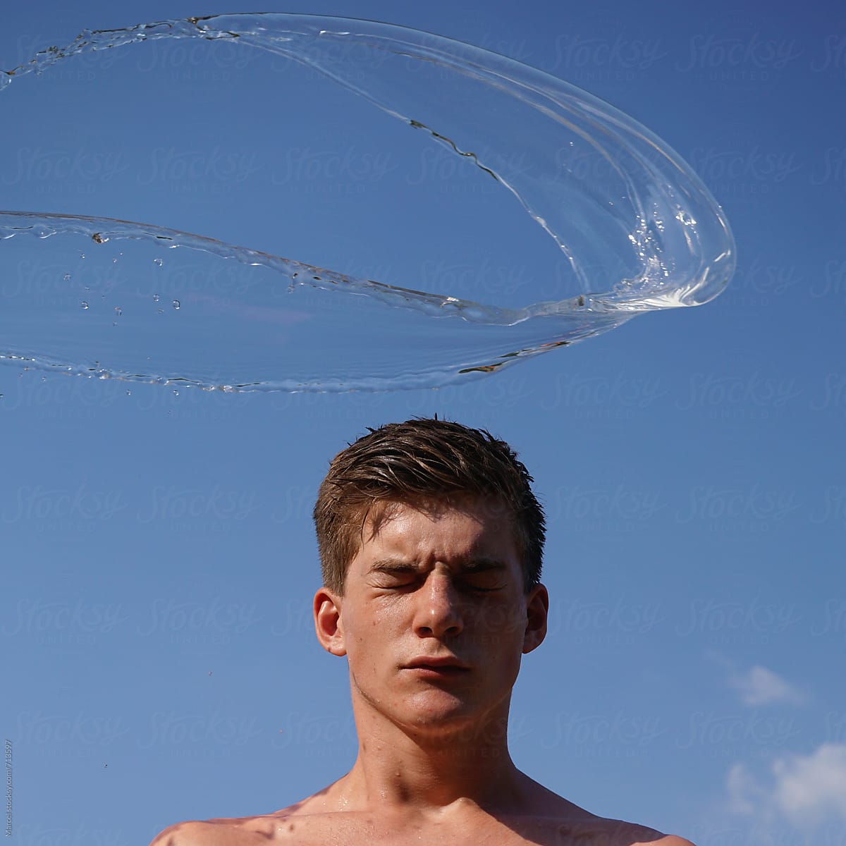 "Wave Of Water Above A Young Man's Head" by Stocksy Contributor "Marcel ...