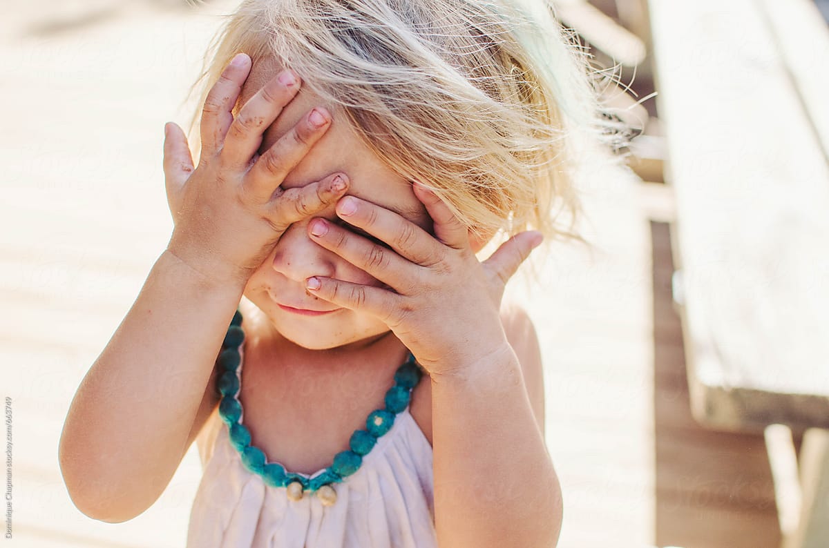 "Small Child Playing Peek-a-boo" by Stocksy Contributor "Dominique ...