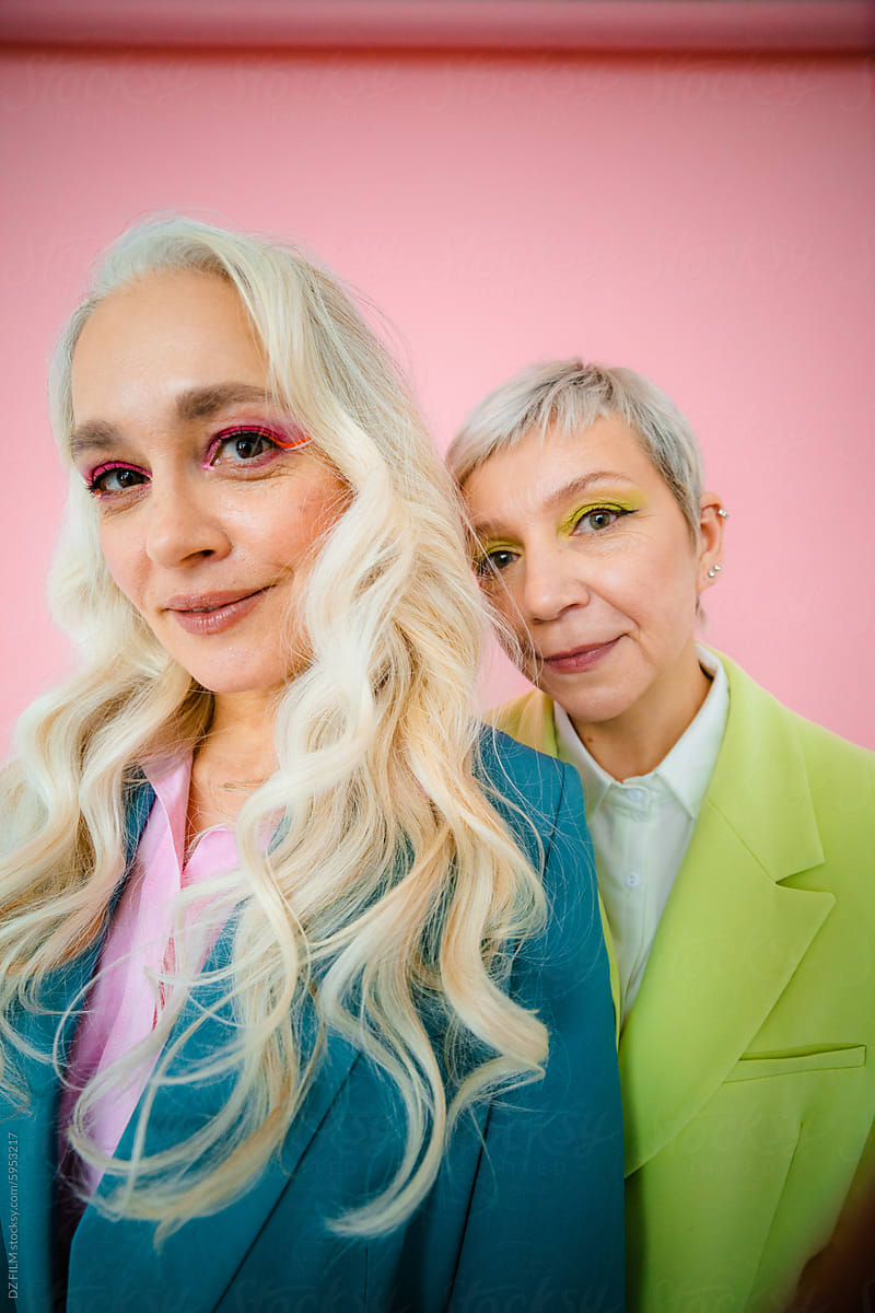"Portrait Of Two Bright Women" by Stocksy Contributor "DZ FILM" - Stocksy