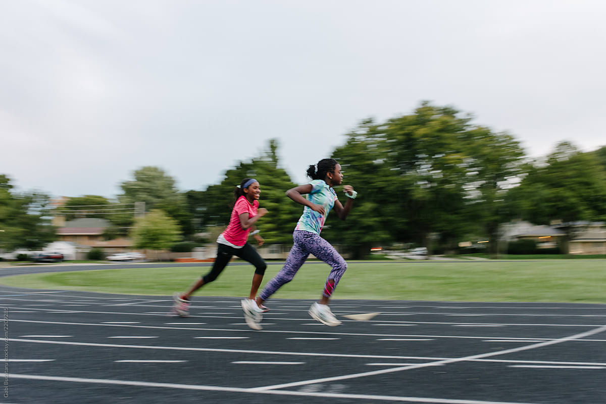 "Two Girls On A Track" by Stocksy Contributor "Gabi Bucataru" - Stocksy