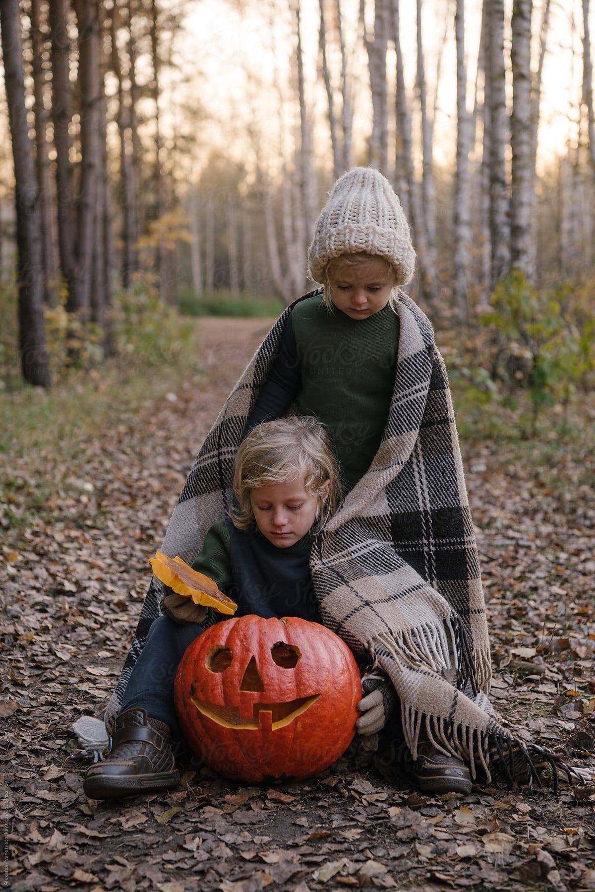 "Kids Playing With Halloween Pumpkin" by Stocksy Contributor "Alexandr ...