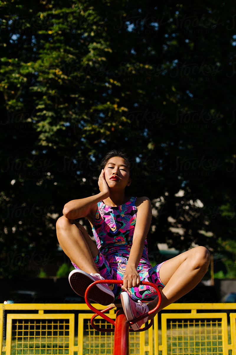 "Teen Girl Posing At The Playground" by Stocksy Contributor "Nabi Tang ...