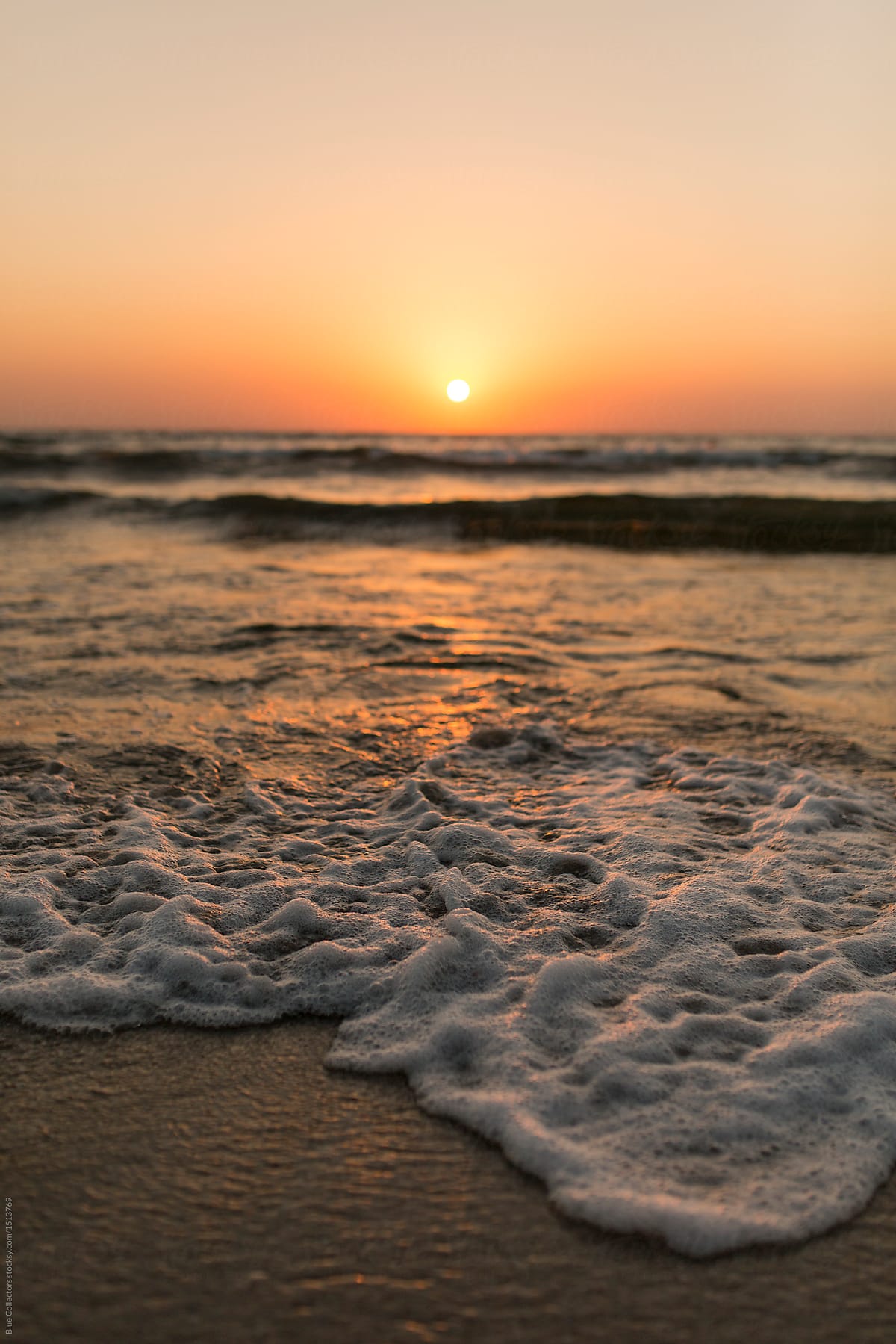 "Close Up Shorebreak On A Sandy Beach At Sunset" by Stocksy Contributor ...