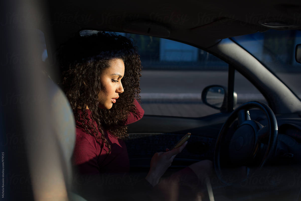 Reaching For Phone In Car