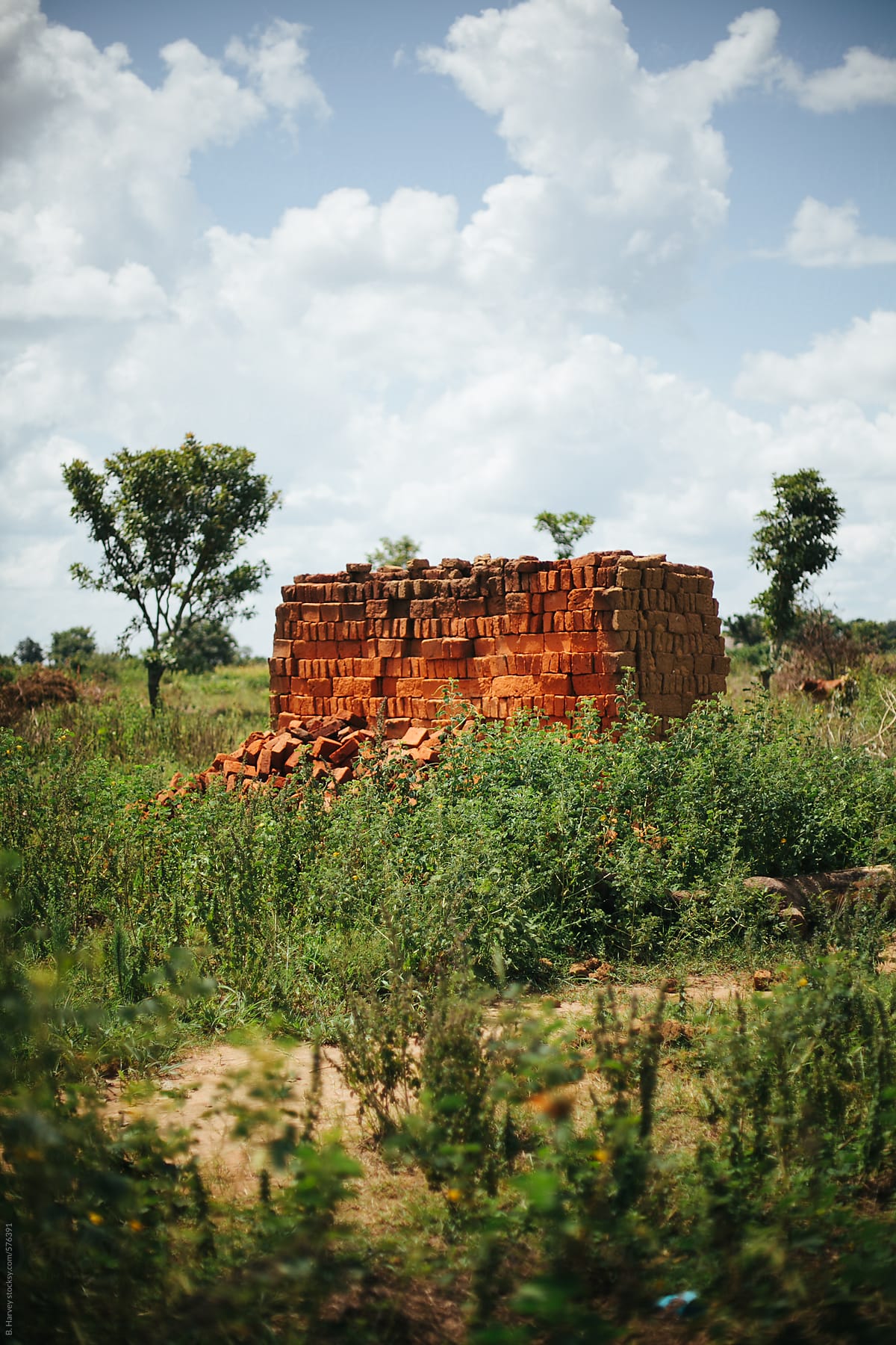 "Red Clay Bricks Standing In Sun In Uganda" by Stocksy Contributor ...