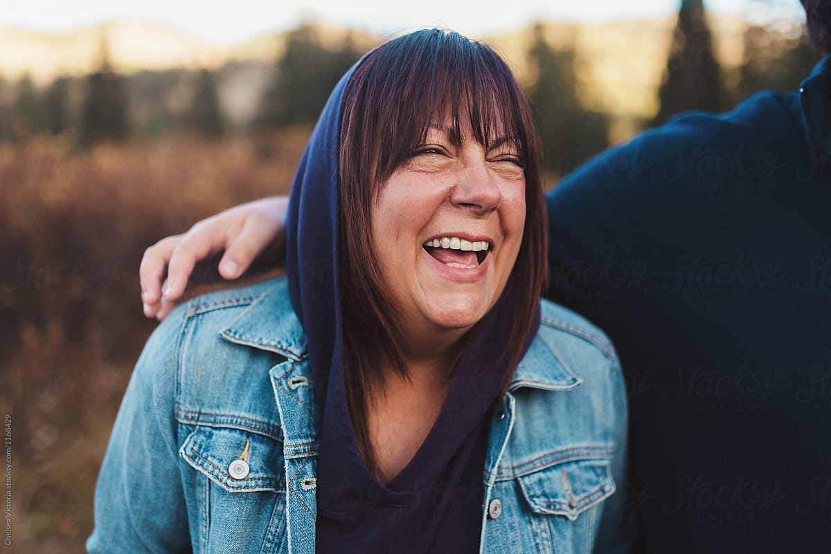 "A Woman In Her Fifties Laughing" by Stocksy Contributor "Chelsea ...