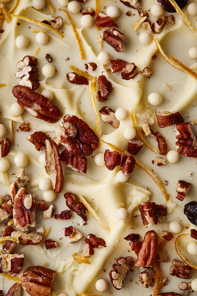 "White Chocolate With Pecans" by Stocksy Contributor "Paperclip" - Stocksy