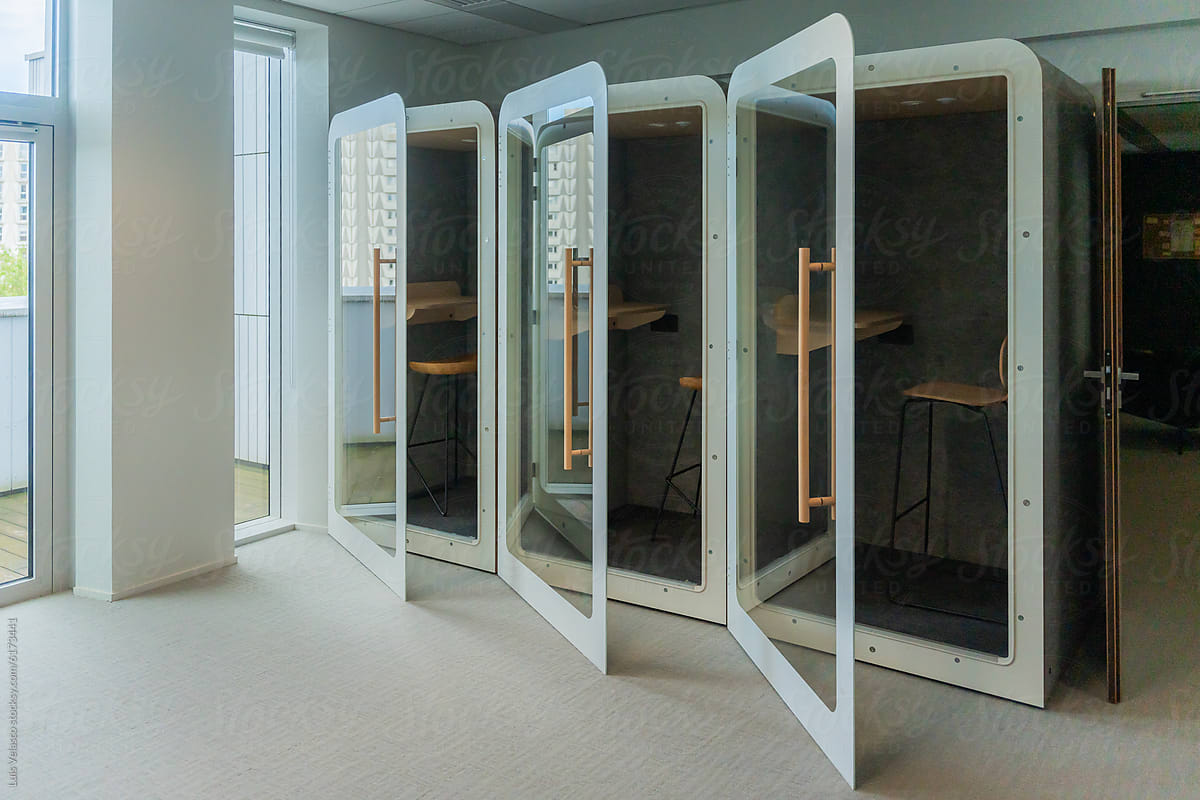 "Private Work Pods In Office" by Stocksy Contributor "Luis Velasco ...