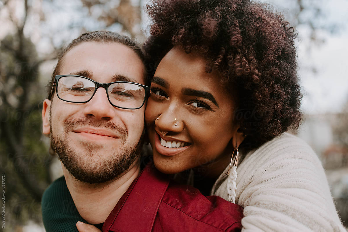 "A Young Mixed Race Couple At Christmas Time." by Stocksy Contributor ...