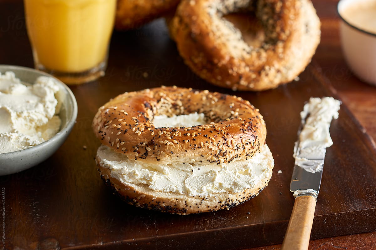 "Fresh Bagels With Cream Cheese" by Stocksy Contributor "Jeff Wasserman ...