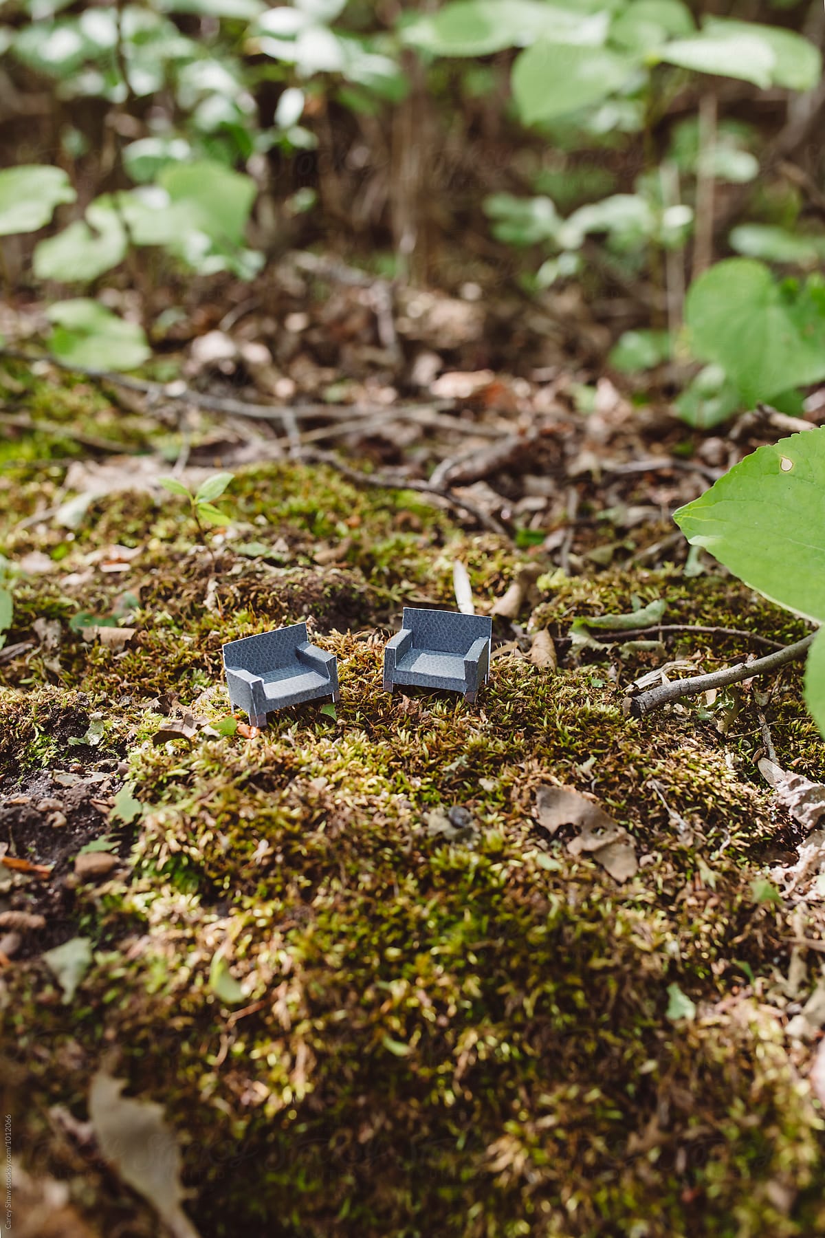"Tiny Paper Chairs In Secluded Forest" by Stocksy Contributor "Carey ...