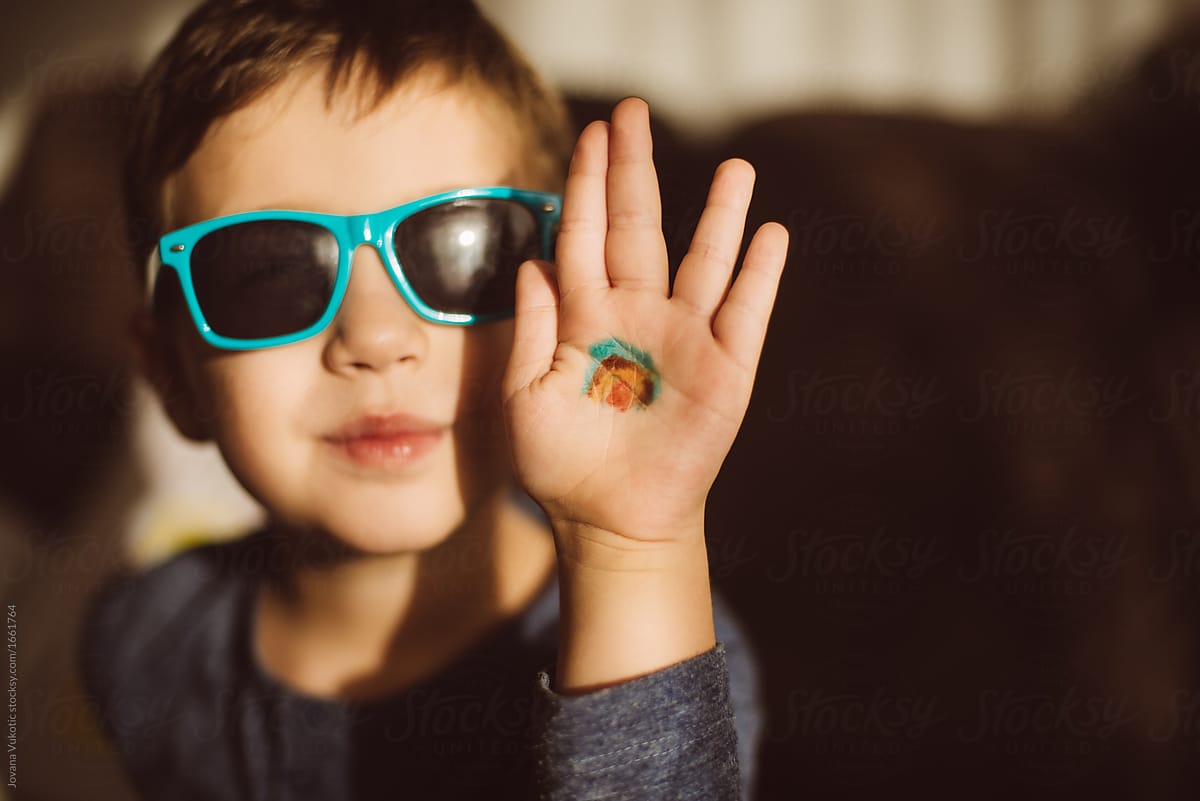"Boy With A Sunglasses On Direct Sunlight" by Stocksy Contributor ...
