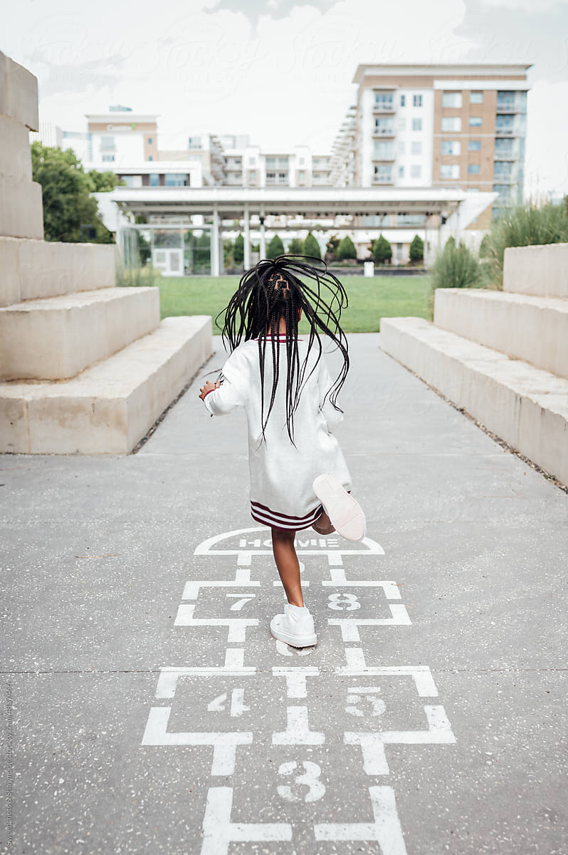 "Hop Scotch" by Stocksy Contributor "Sweenshots & Shaymone" - Stocksy
