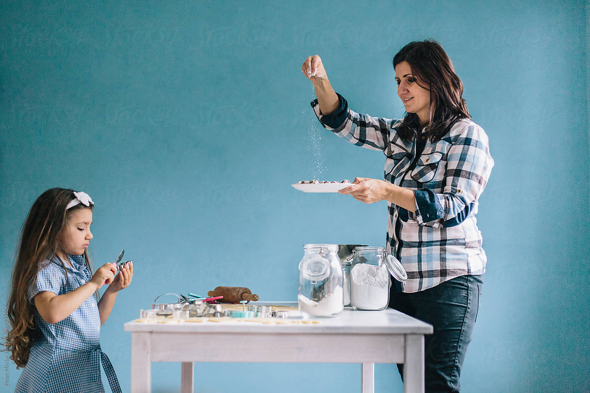 "Mother And Daughter Baking A Cakes With Chocolate Crinkles And Sweet ...