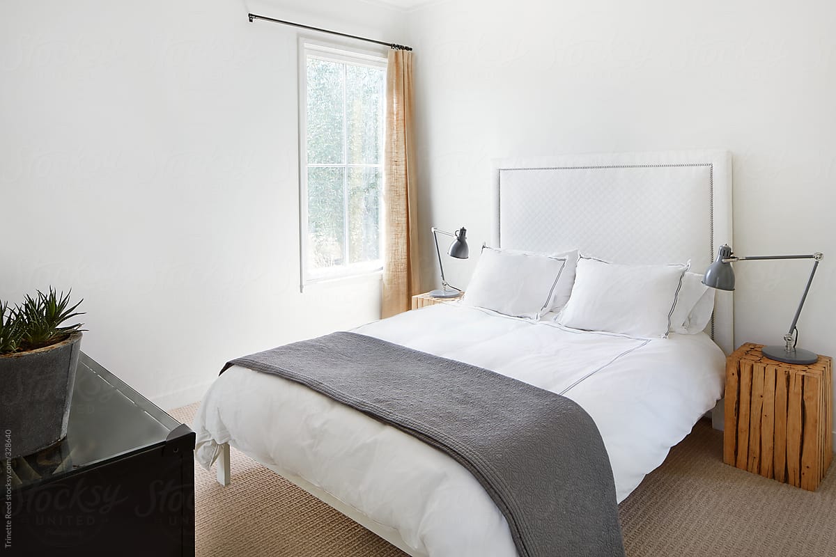 "Simple Bedroom In Modern Home" by Stocksy Contributor "Trinette Reed ...