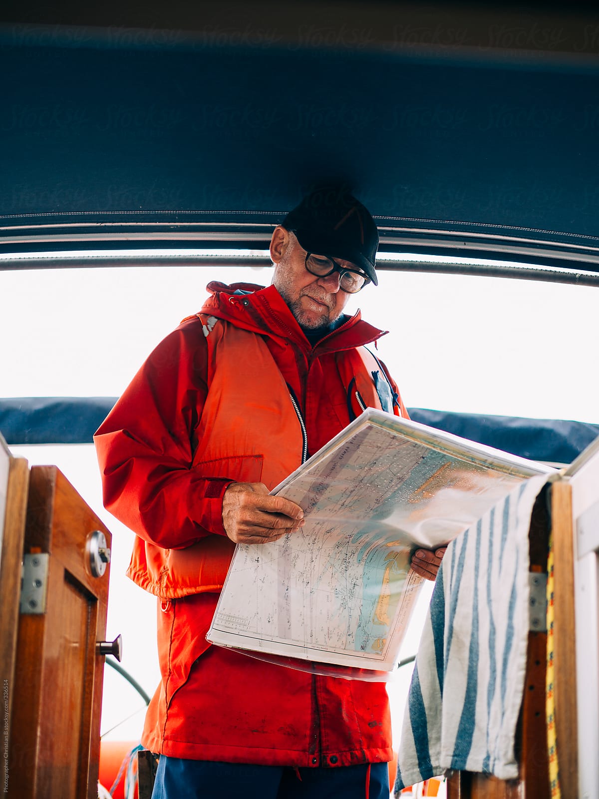 "Adult Man On A Boat" by Stocksy Contributor "Photographer Christian B ...