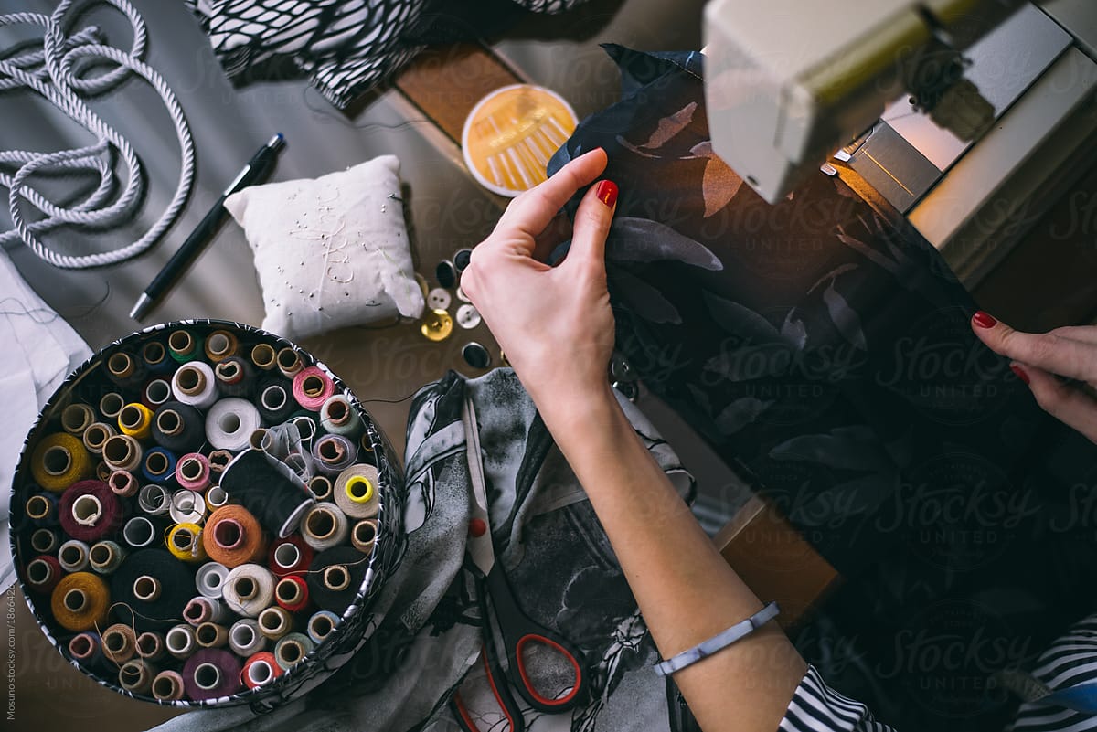 "Tailor Working At Home" by Stocksy Contributor "Mosuno" - Stocksy