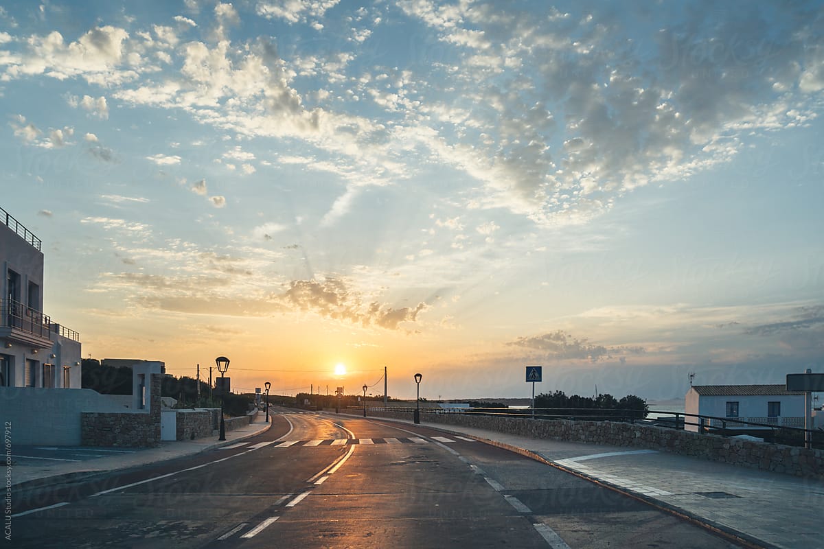 "Town Street With Intense Sunset" by Stocksy Contributor "ACALU Studio ...