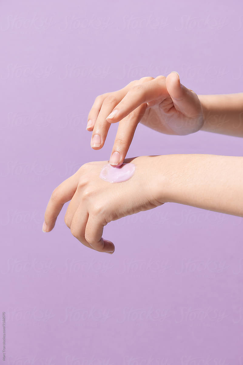 "Female Hands Using Body Lotion" by Stocksy Contributor "Marc Tran ...