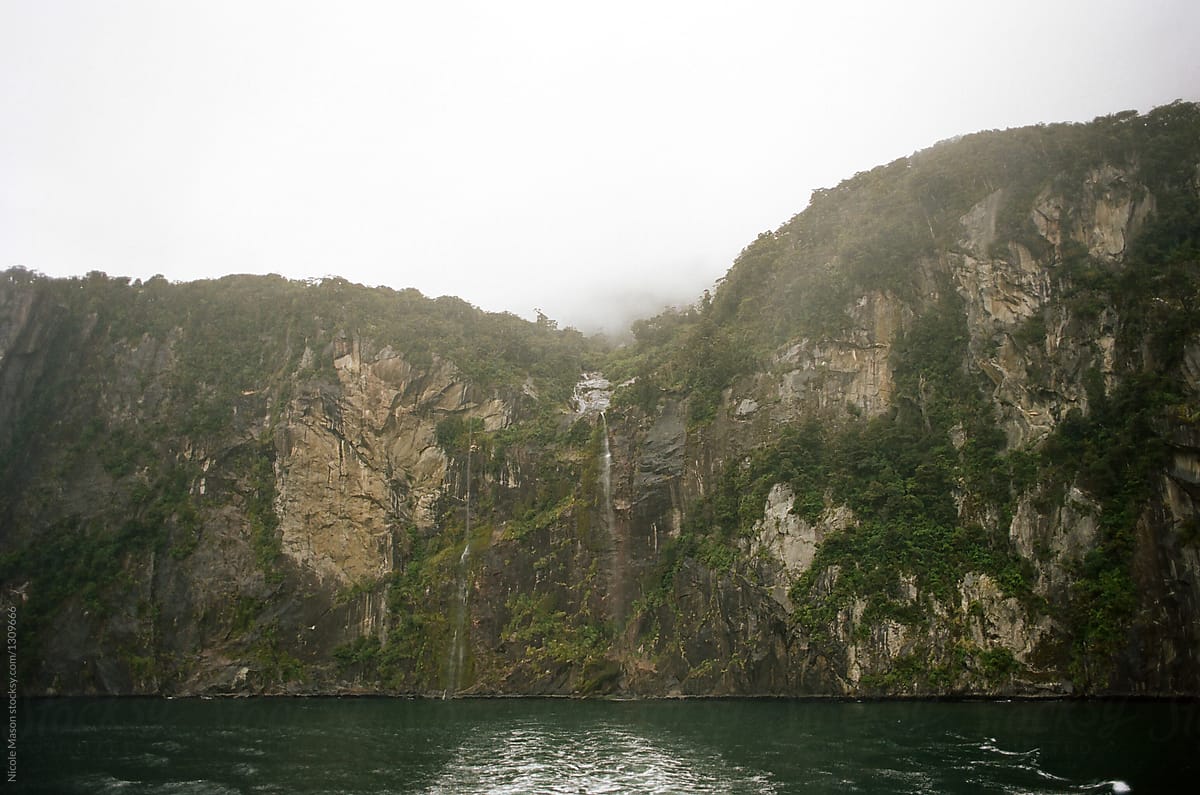 "Tall New Zealand Cliffside Covered In Greenery" by Stocksy Contributor ...