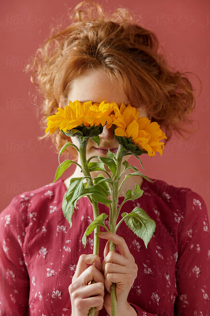 "Ginger Woman With Sunflowers" by Stocksy Contributor "Danil Nevsky ...