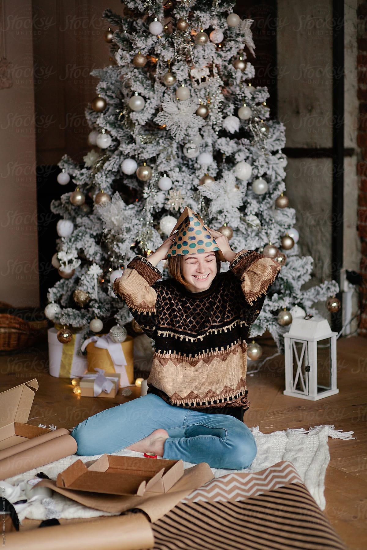 "Happy Woman Packing Christmas Gift" by Stocksy Contributor "Serge ...