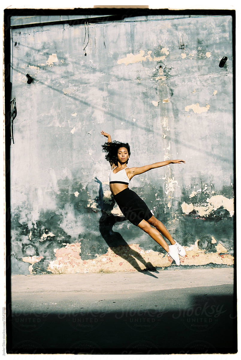 "Fit Woman Dancing On Street" by Stocksy Contributor "Javier Díez ...