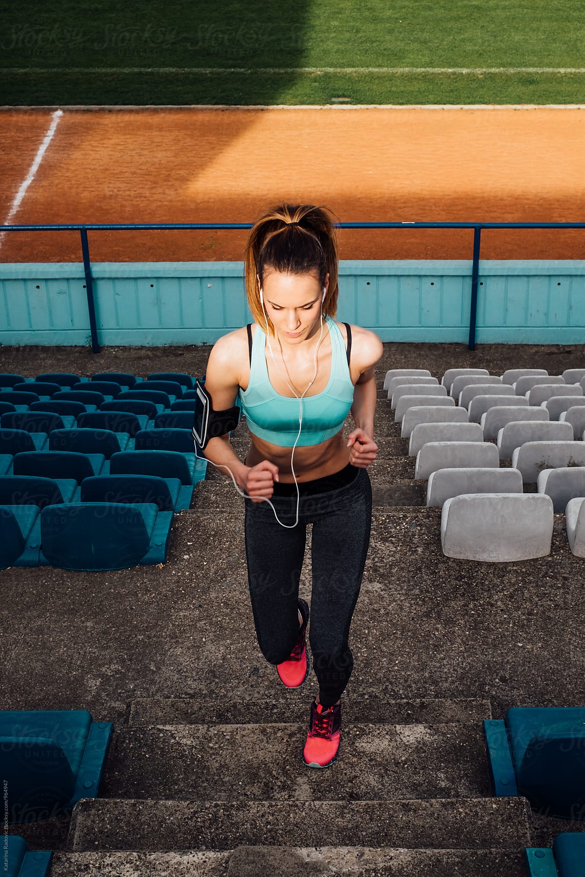 "Fit Woman Running The Stairs" by Stocksy Contributor "Katarina Radovic ...
