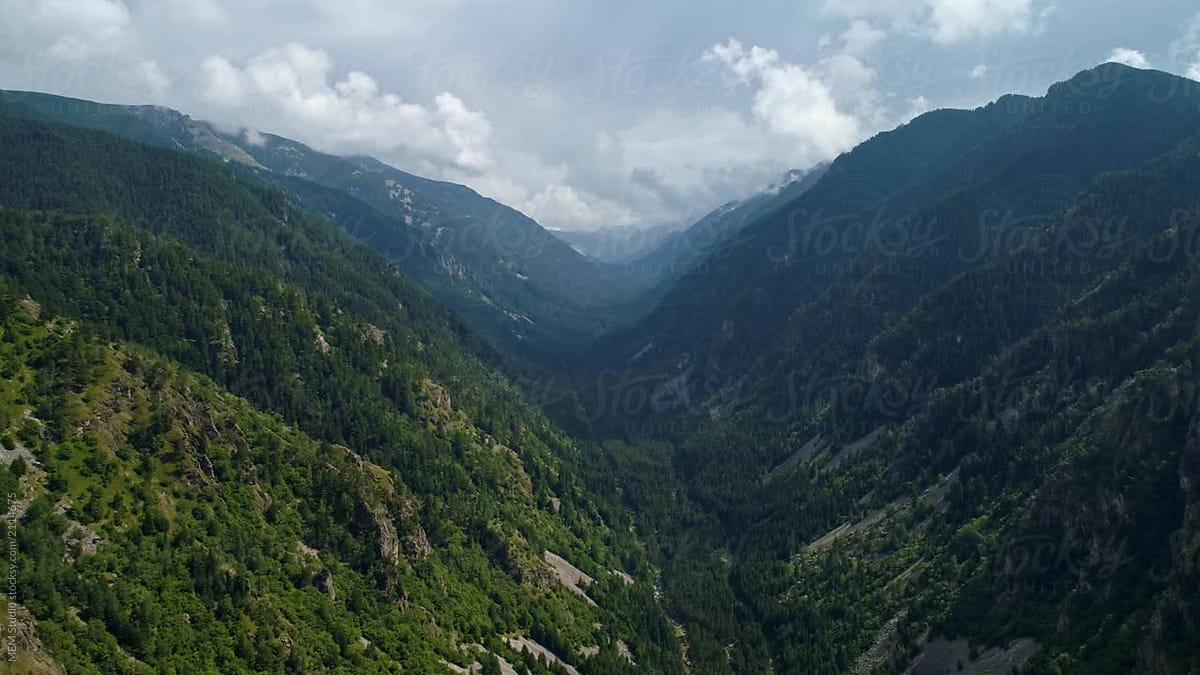 "Mountain Valley" by Stocksy Contributor "MEM Studio" - Stocksy