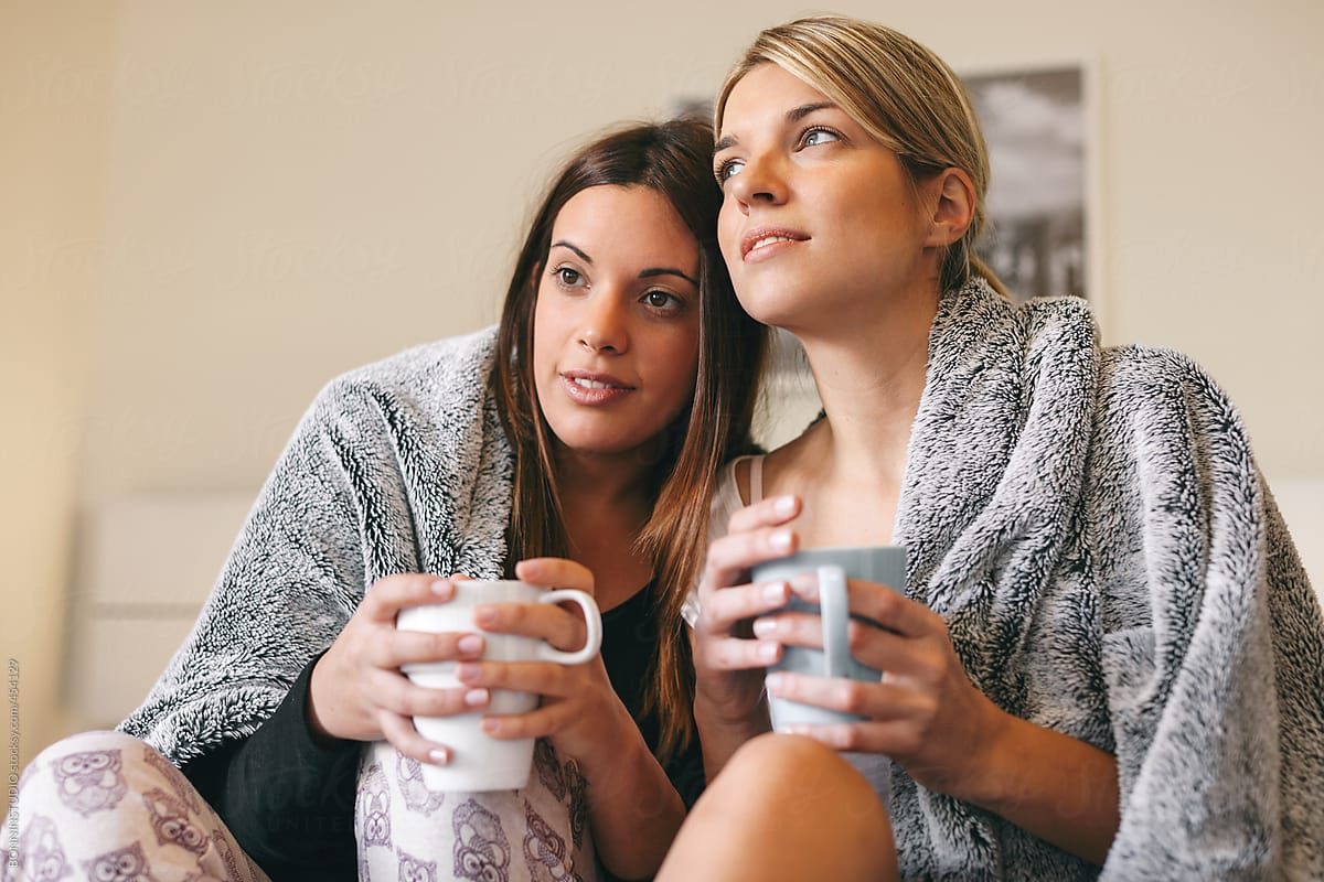 "Two Roommates Warming With Cozy Blanket Drinking Coffee At Morning ...