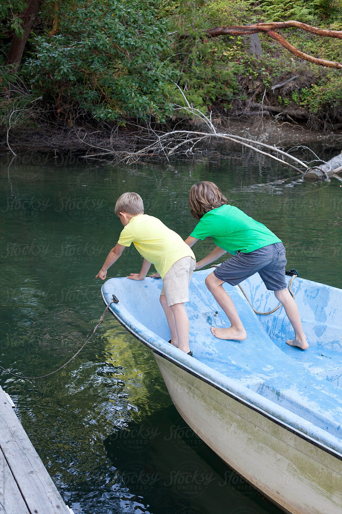 "Brothers Enjoy Time Together On A Boat" by Stocksy Contributor "John ...