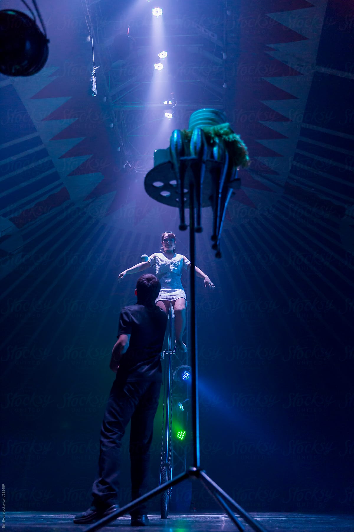 "Circus Performer On Unicycle Receiving Items For Juggling" by Stocksy ...